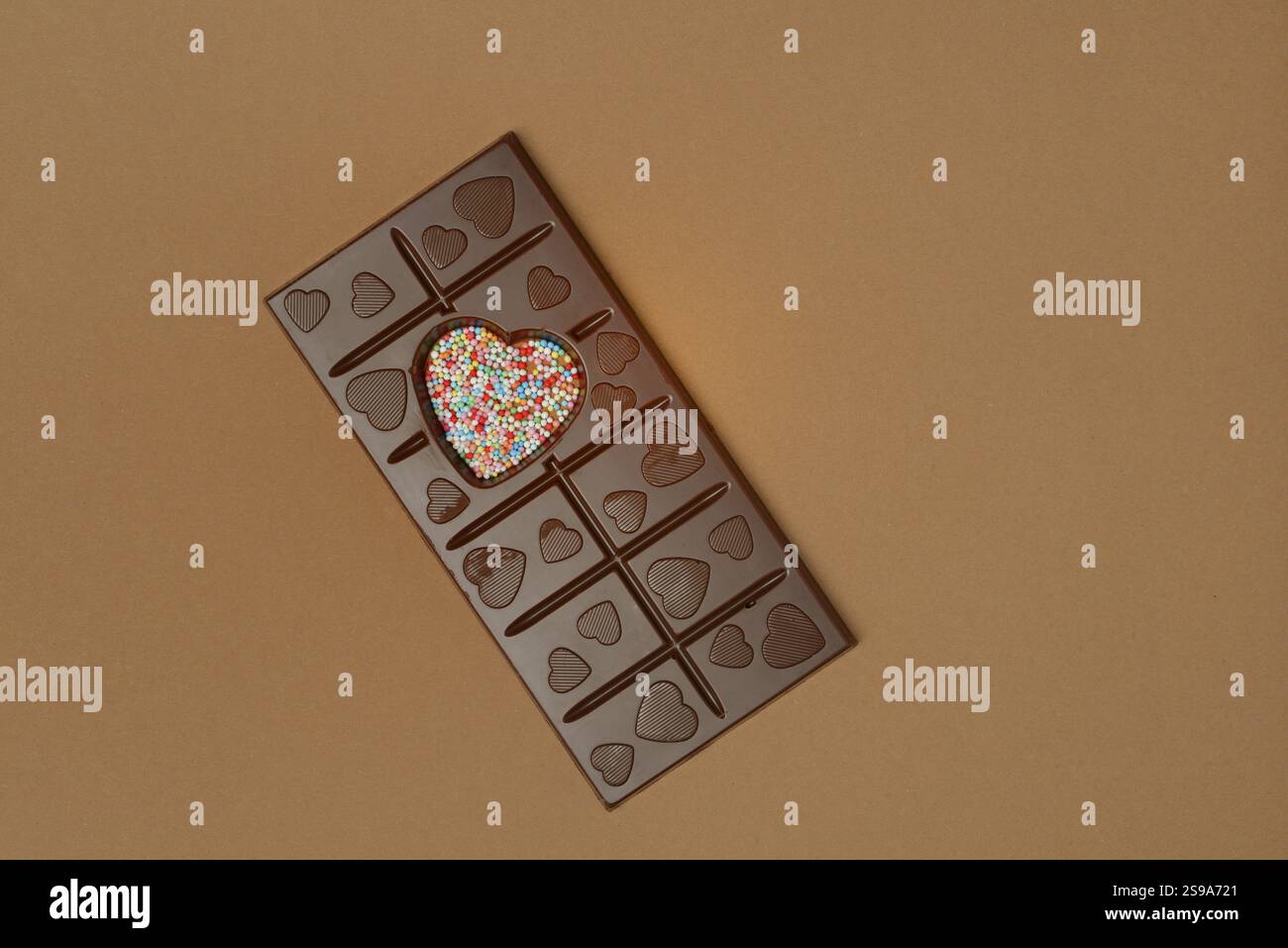 Chocolate bar with heart shape Stock Photo - Alamy