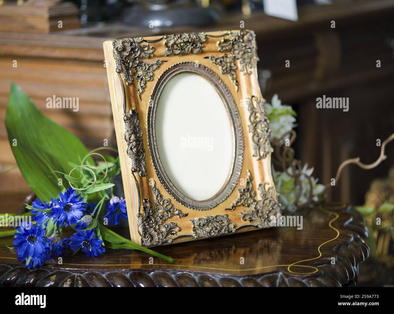 Still life with antique, decorated frame Stock Photo - Alamy