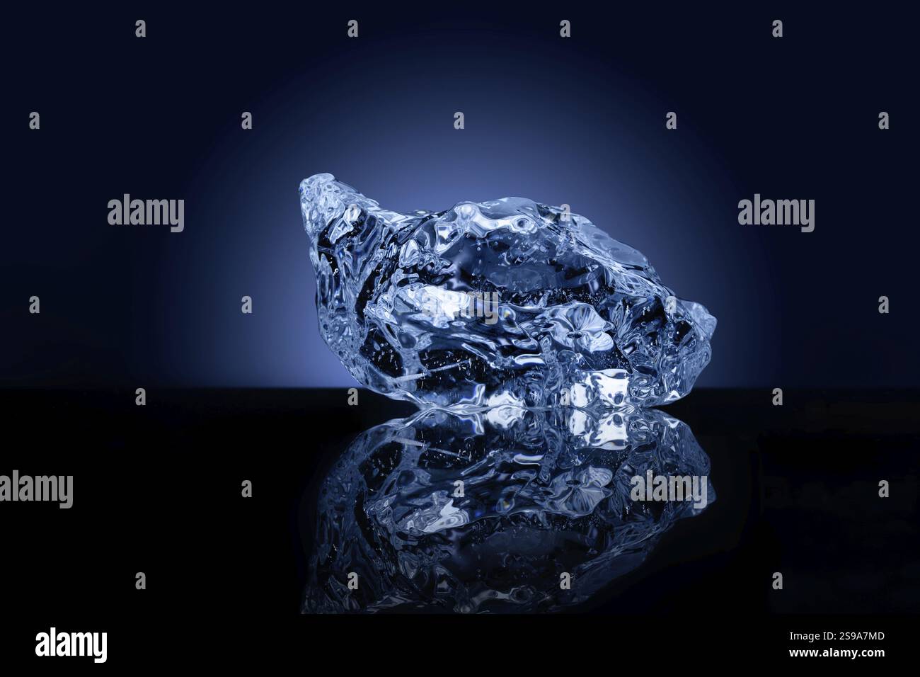 Frozen block of ice with blue tinted background Stock Photo - Alamy