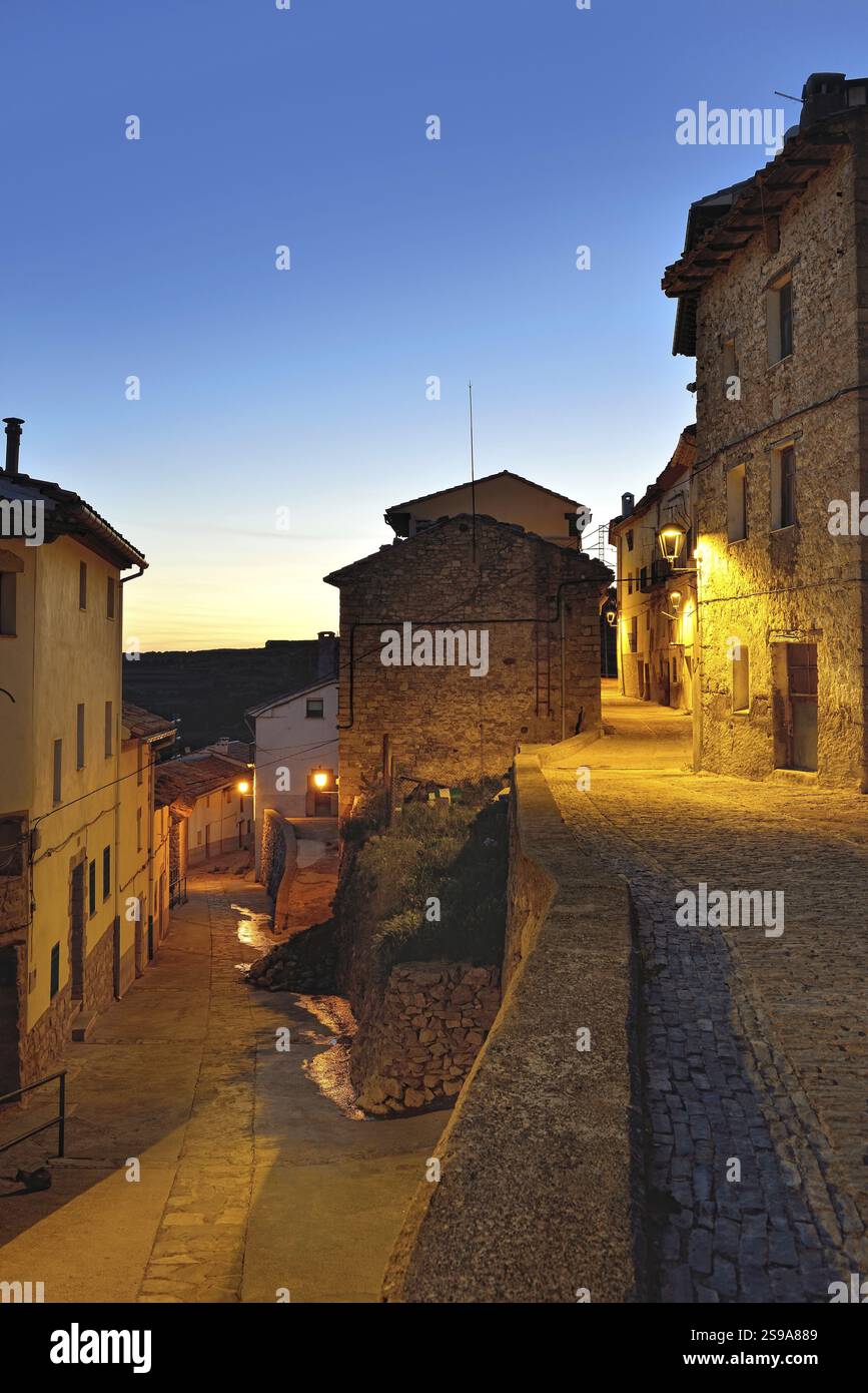 Streets of the old town centre of Ares in Spain. Evening time. Darkness ...