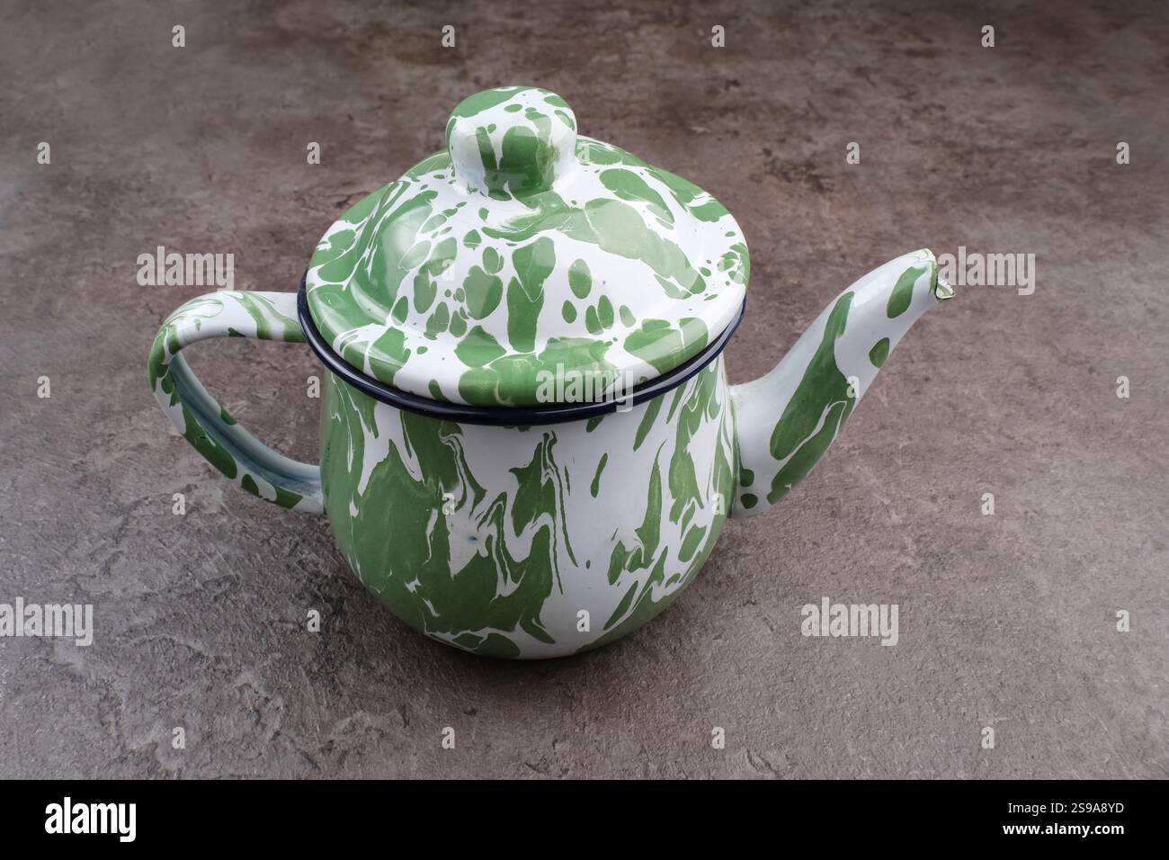 Old classic enamel teapot, kitchen utensils Stock Photo - Alamy