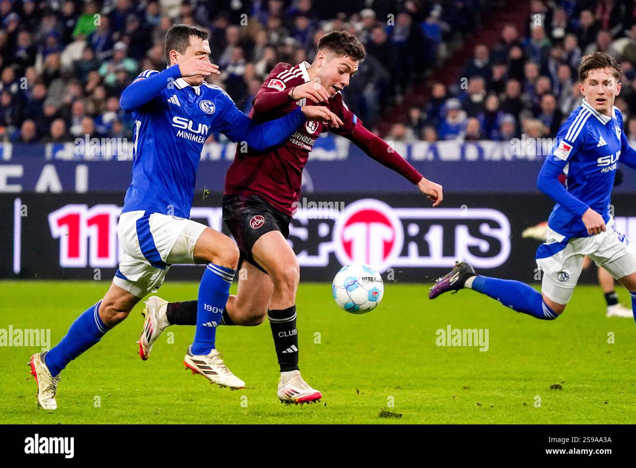 GELSENKIRCHEN, NETHERLANDS - JANUARY 25: Ron Schallenberg of FC Schalke 04 battles for ...