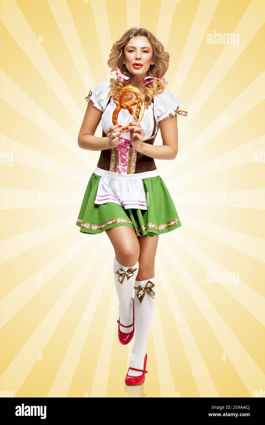 Beautiful happy dancing Oktoberfest woman wearing a traditional ...
