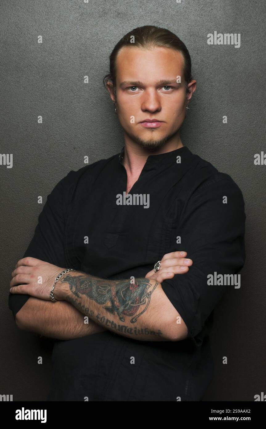 Portrait of a young attractive man with long hair, St. Petersburg ...