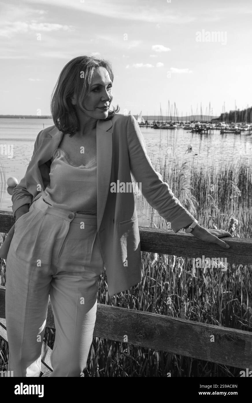 Posing outdoors in Black and White Stock Photos & Images - Alamy