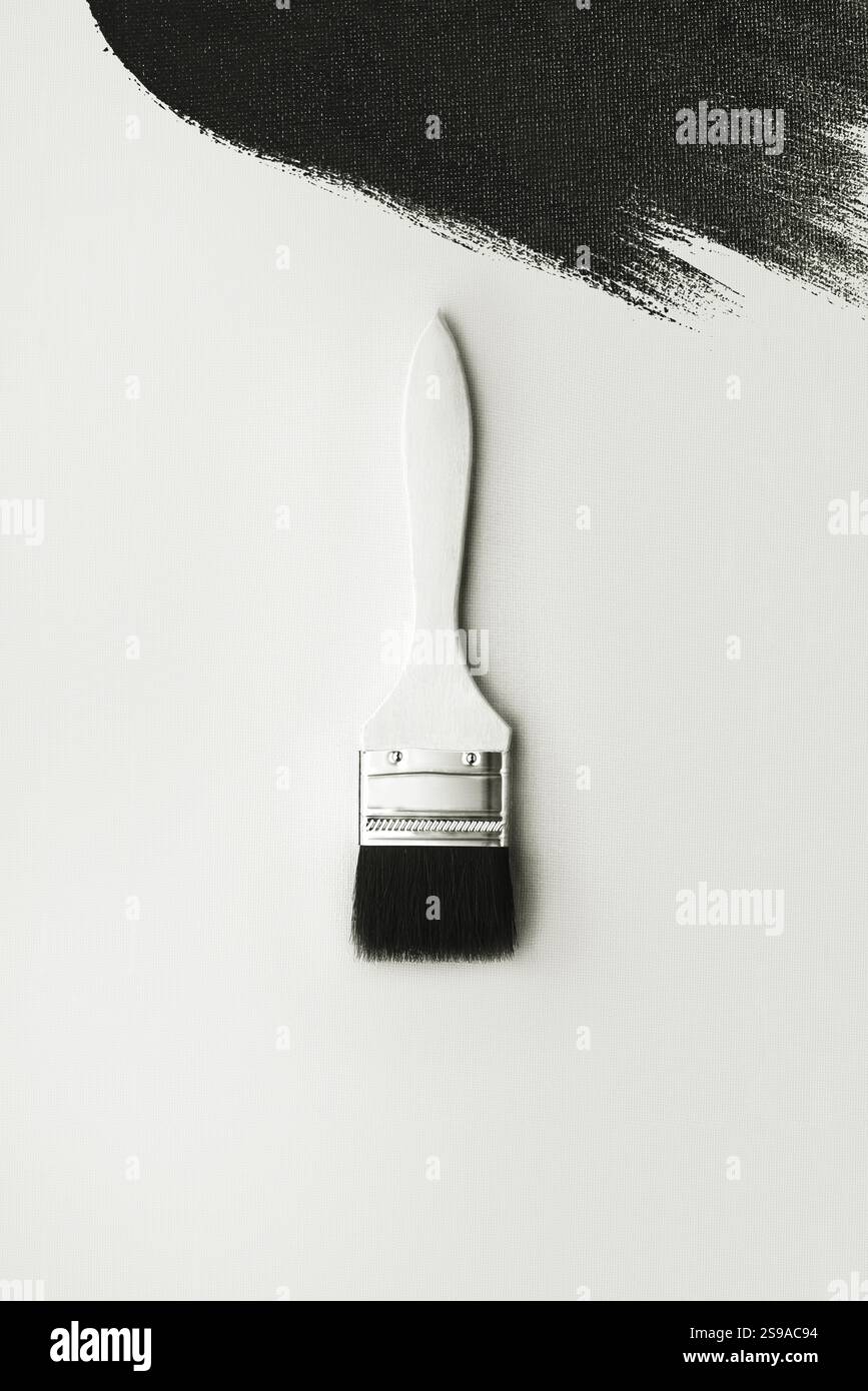 Paint and brushes as the face of the German dictator Adolf Hitler ...