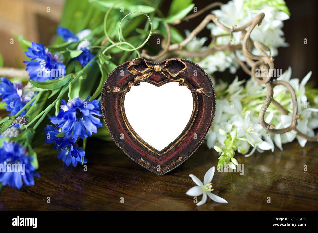 Still life with antique, decorated frame Stock Photo - Alamy