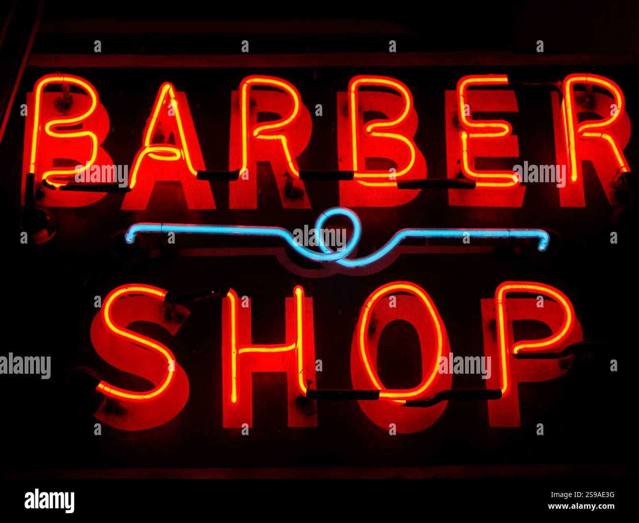 A Barber Shop neon tube detail sign close up Stock Photo - Alamy