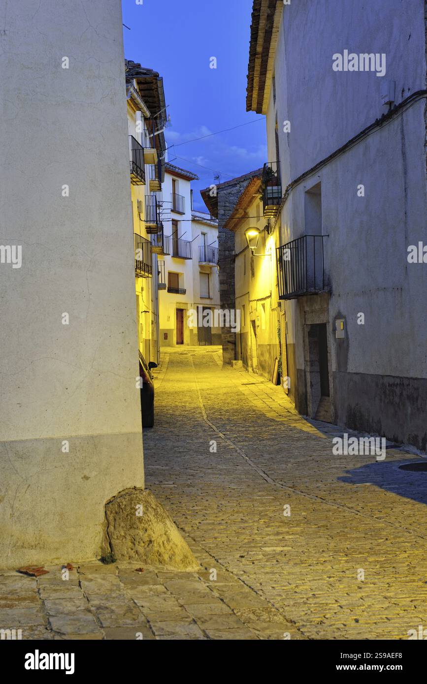 Streets of the old town centre of Ares in Spain. Evening time. Darkness ...