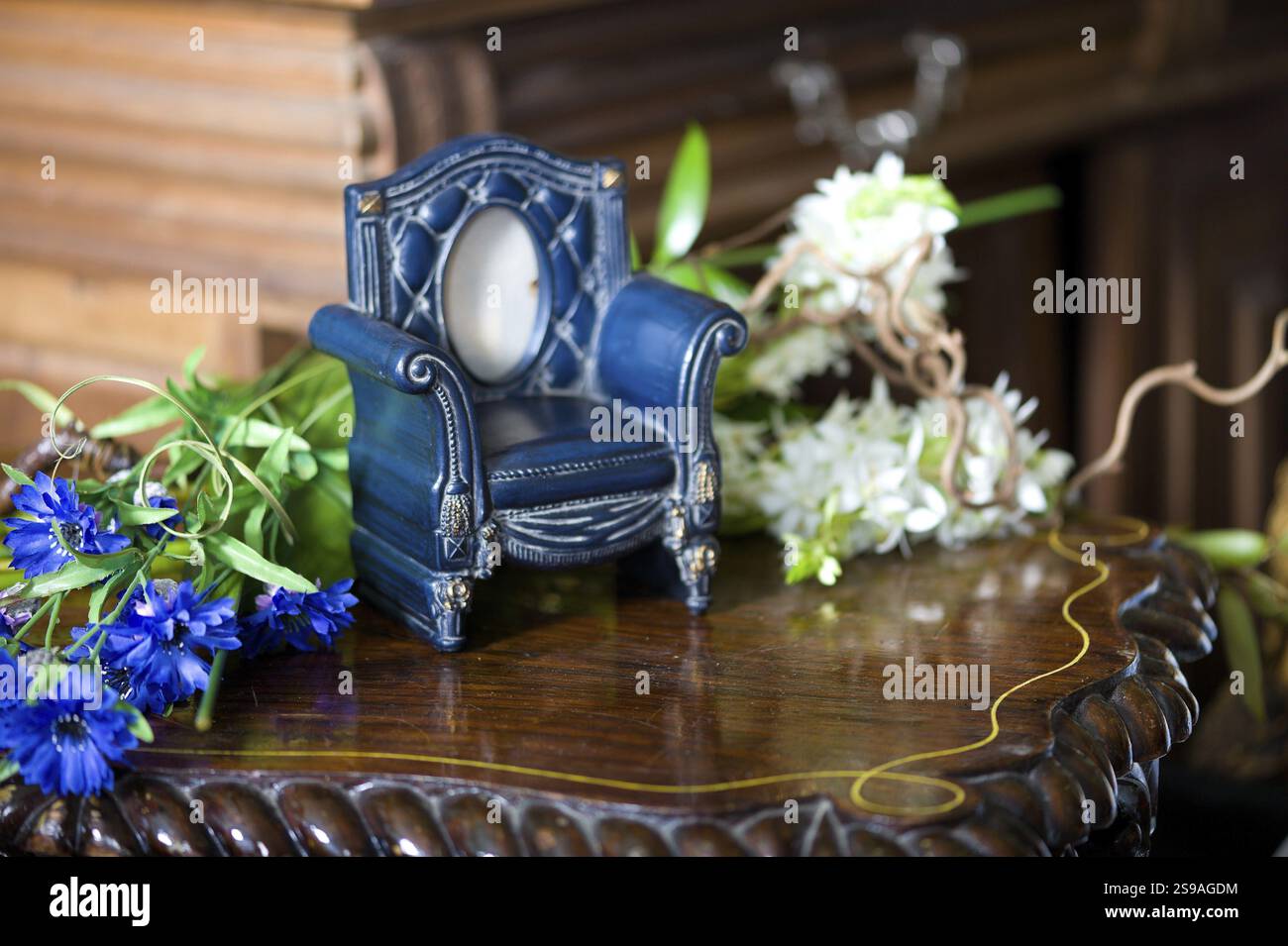 Still life with antique frame in the shape of a chair and flowers Stock ...