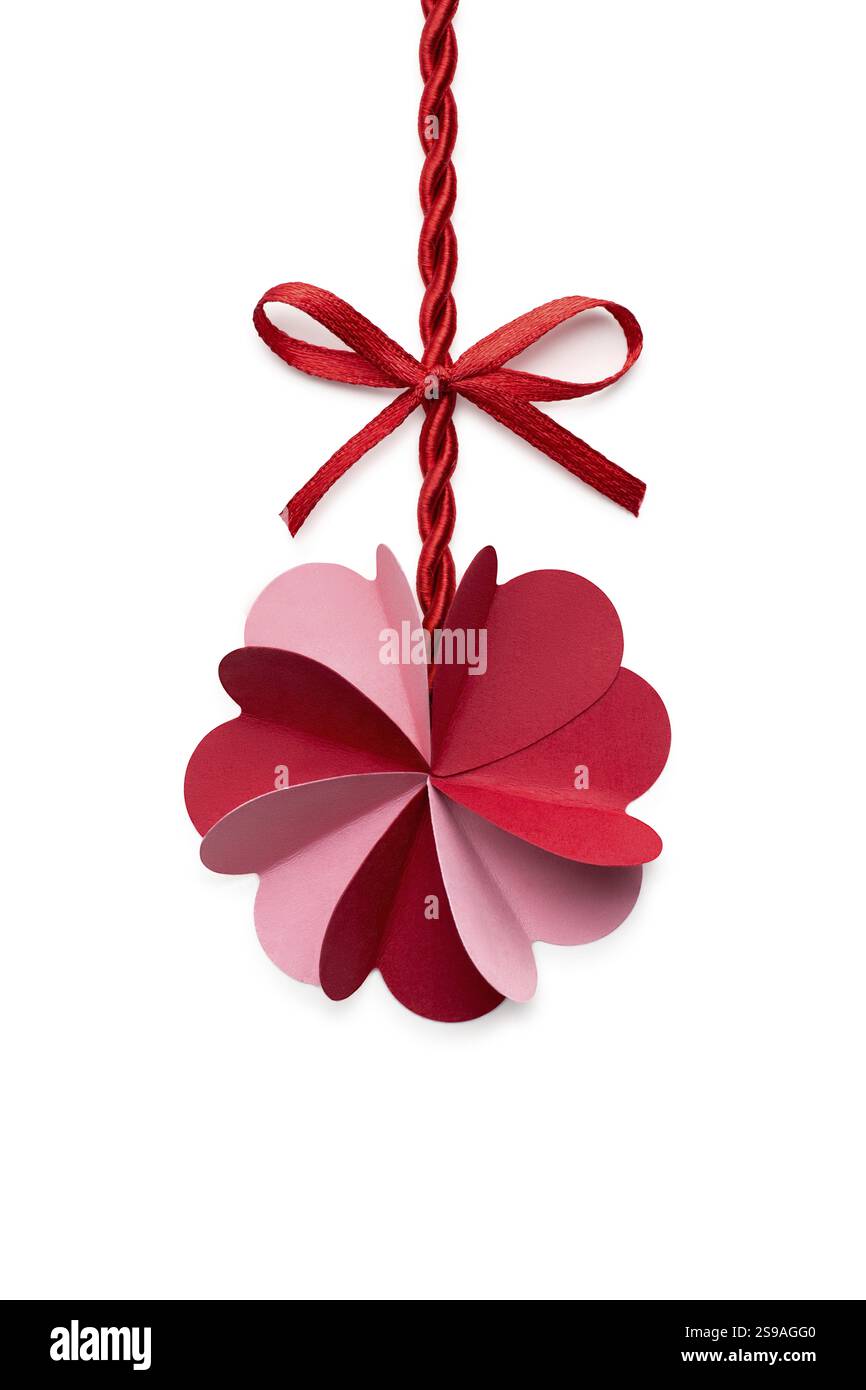 Creative valentines concept photo of a flower made of paper hearts with ...