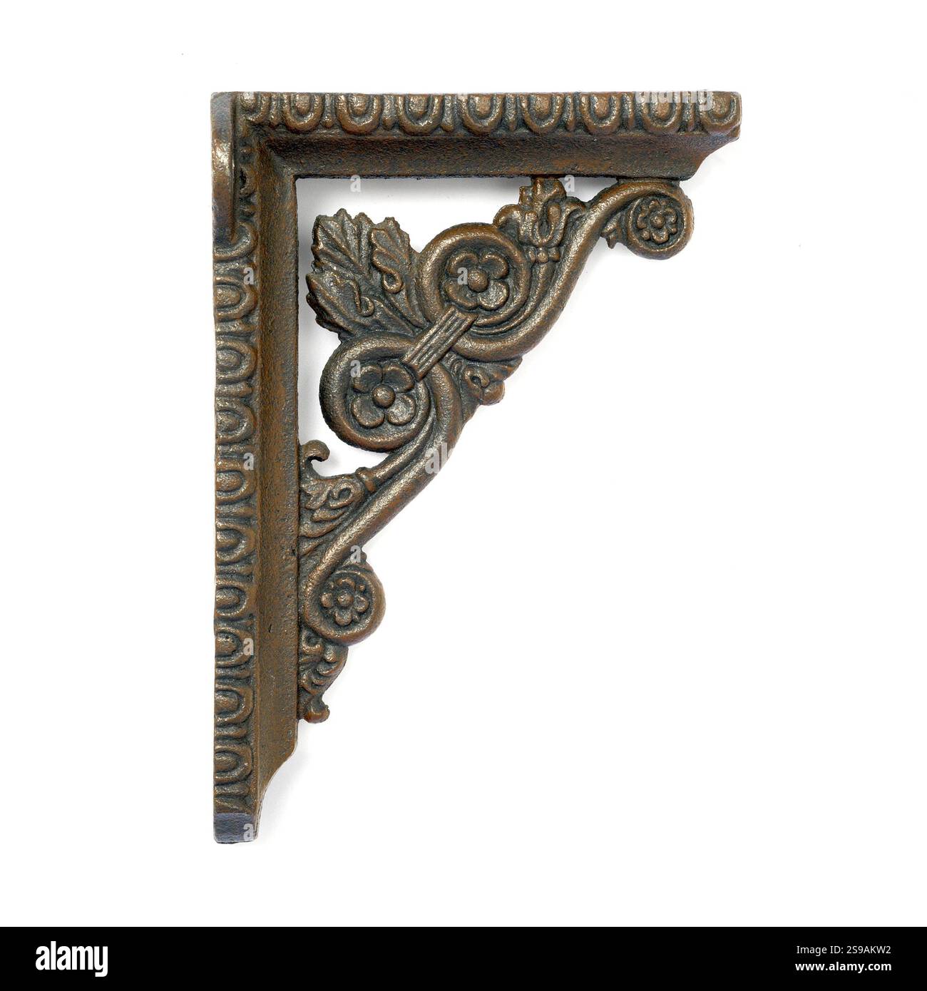 Detail of an antique metal bracket. Isolated image Stock Photo - Alamy