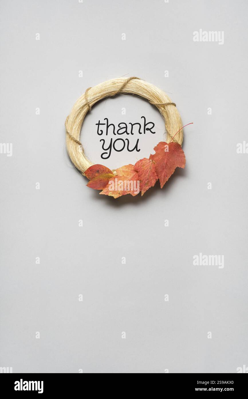 Creative Thanksgiving Day concept photo of leaves on grey background ...