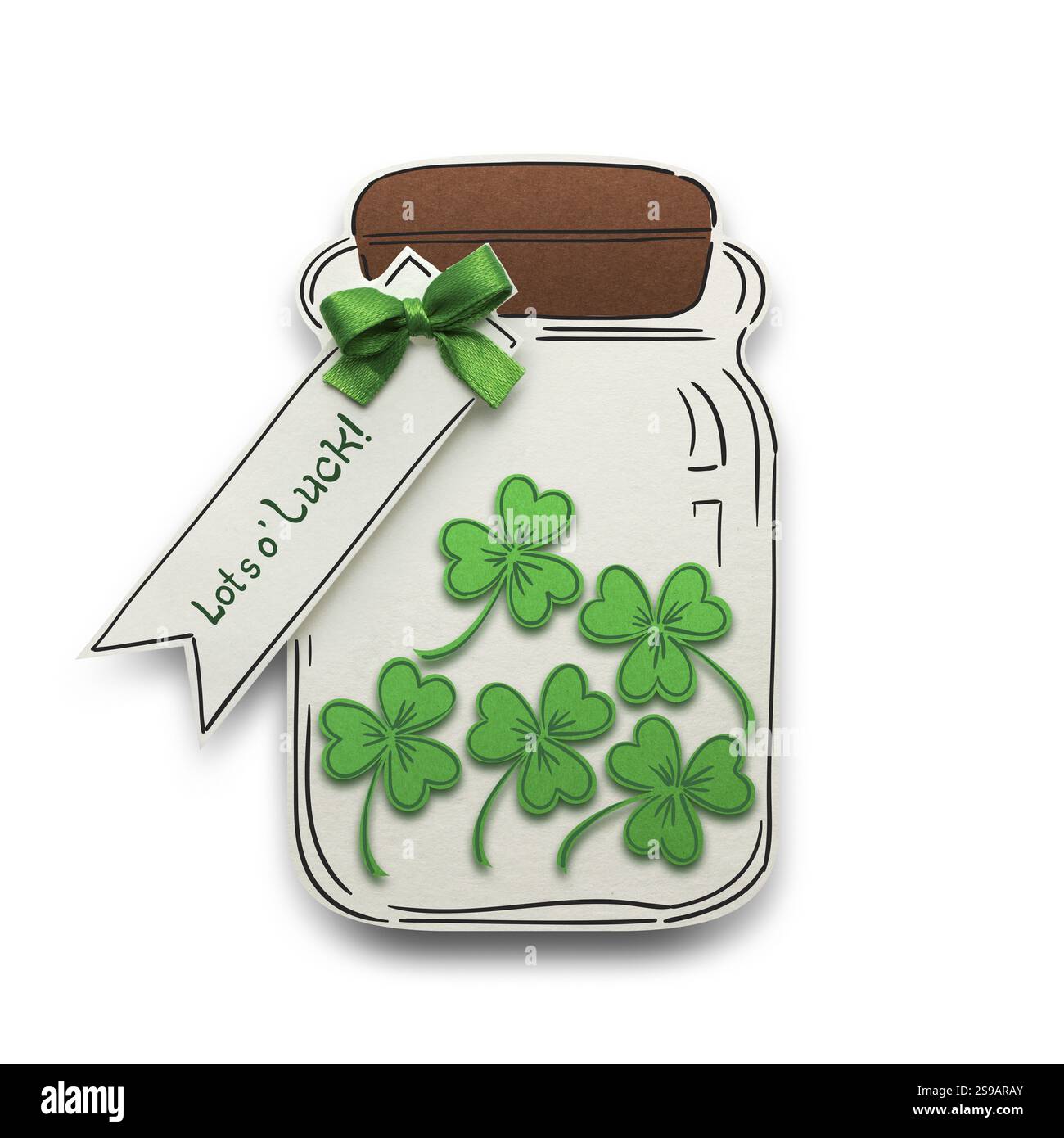 Creative St Patricks Day concept photo of a bottle with paper shamrocks ...