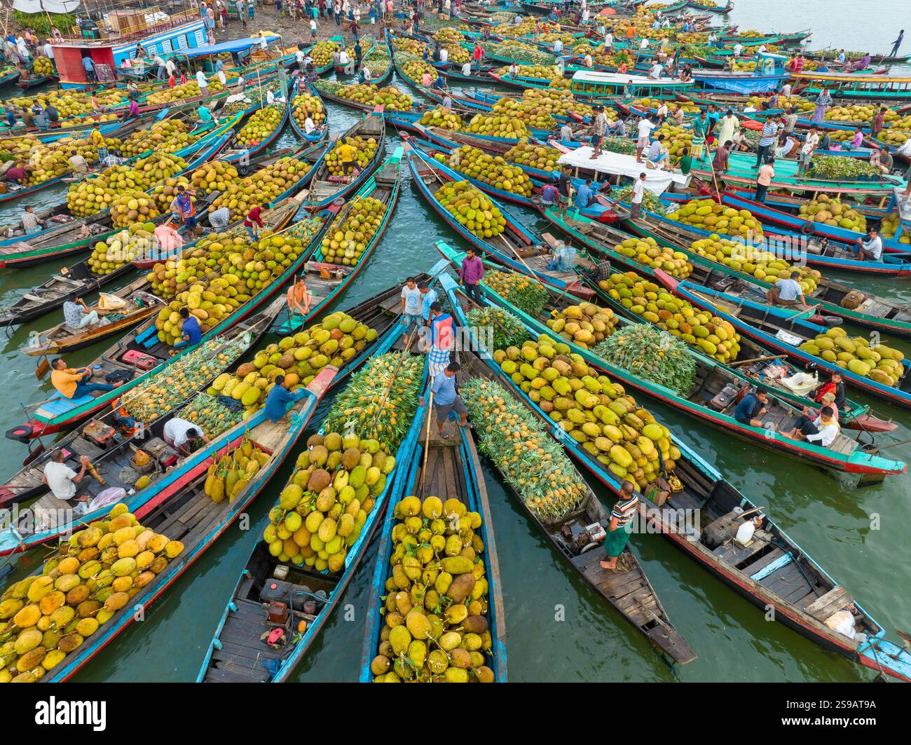 Aerial view of floating market of seasonal fruits on the boats in ...