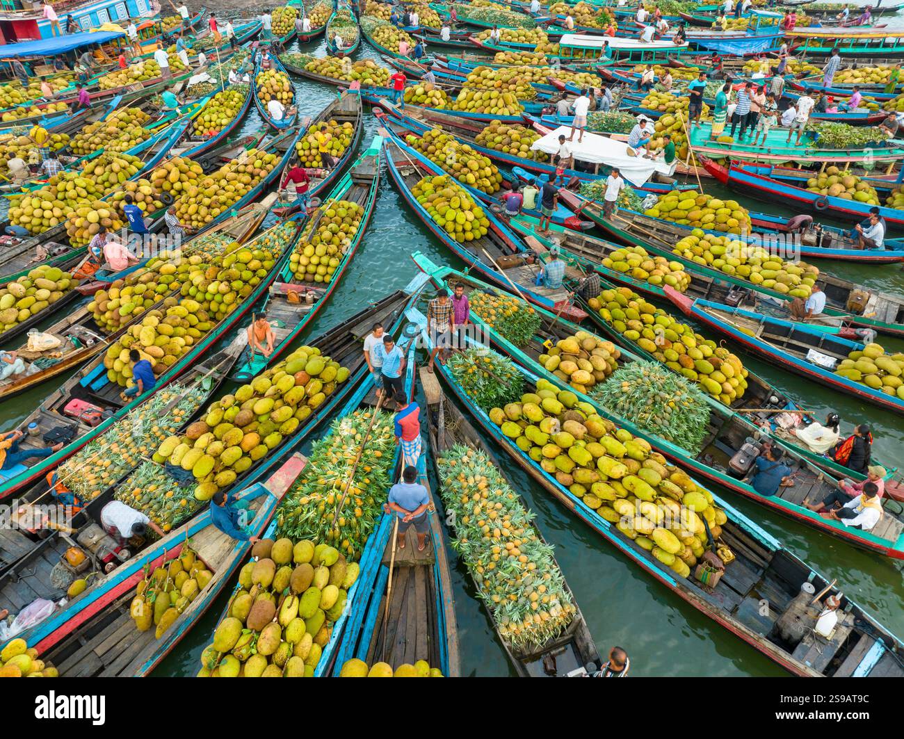 Aerial view of floating market of seasonal fruits on the boats in ...