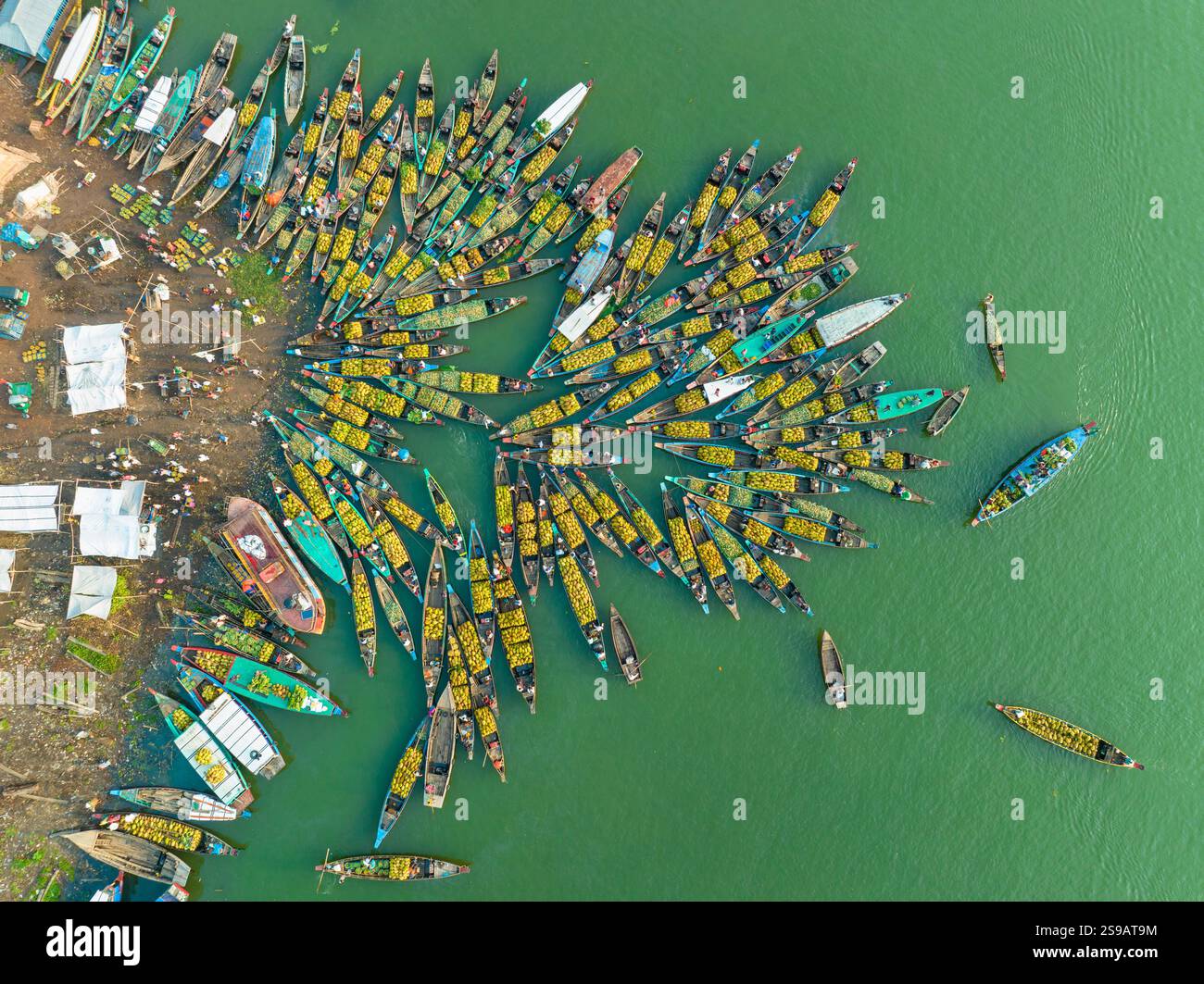 Aerial view of floating market of seasonal fruits on the boats in ...