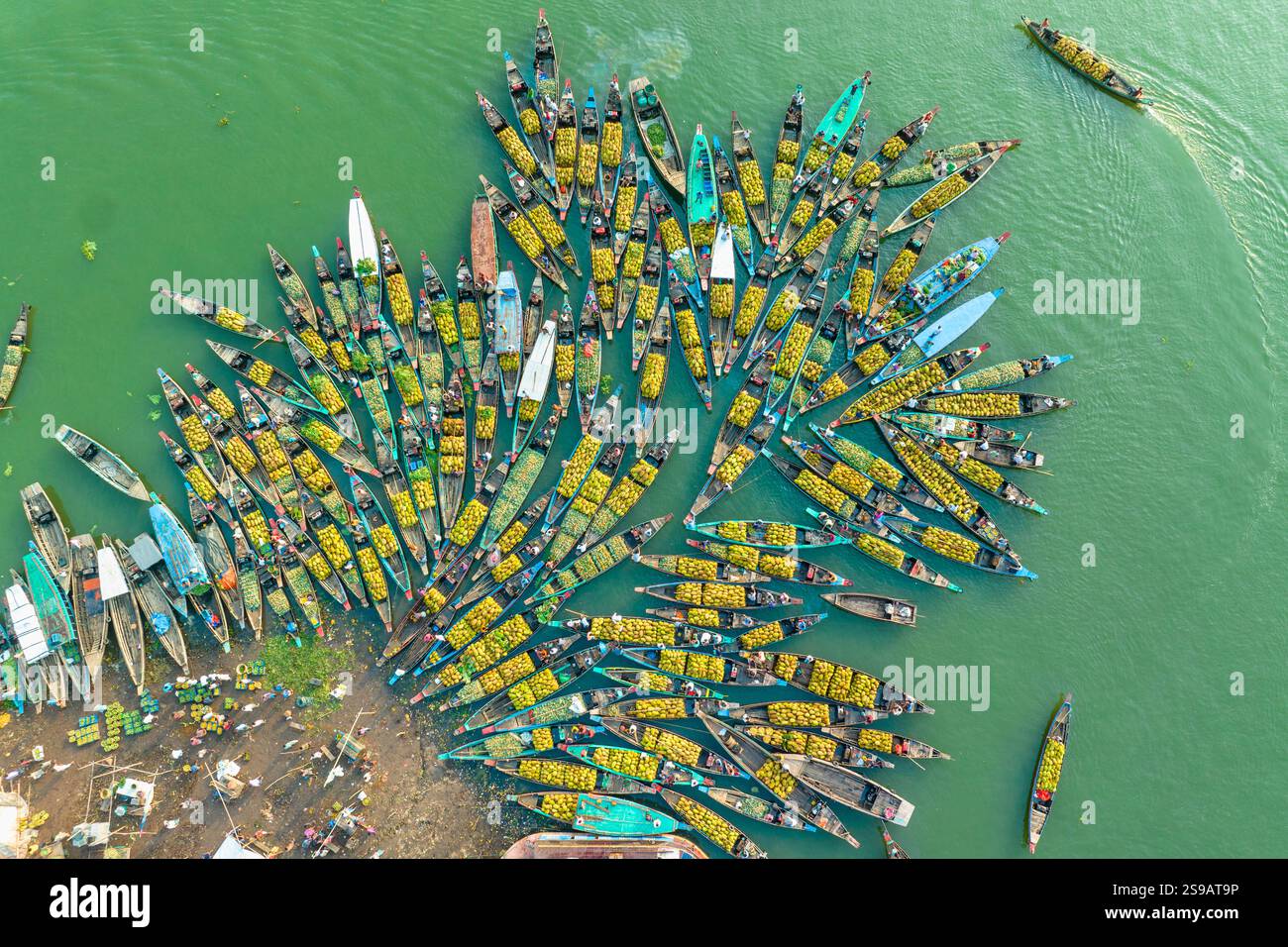 Aerial view of floating market of seasonal fruits on the boats in ...