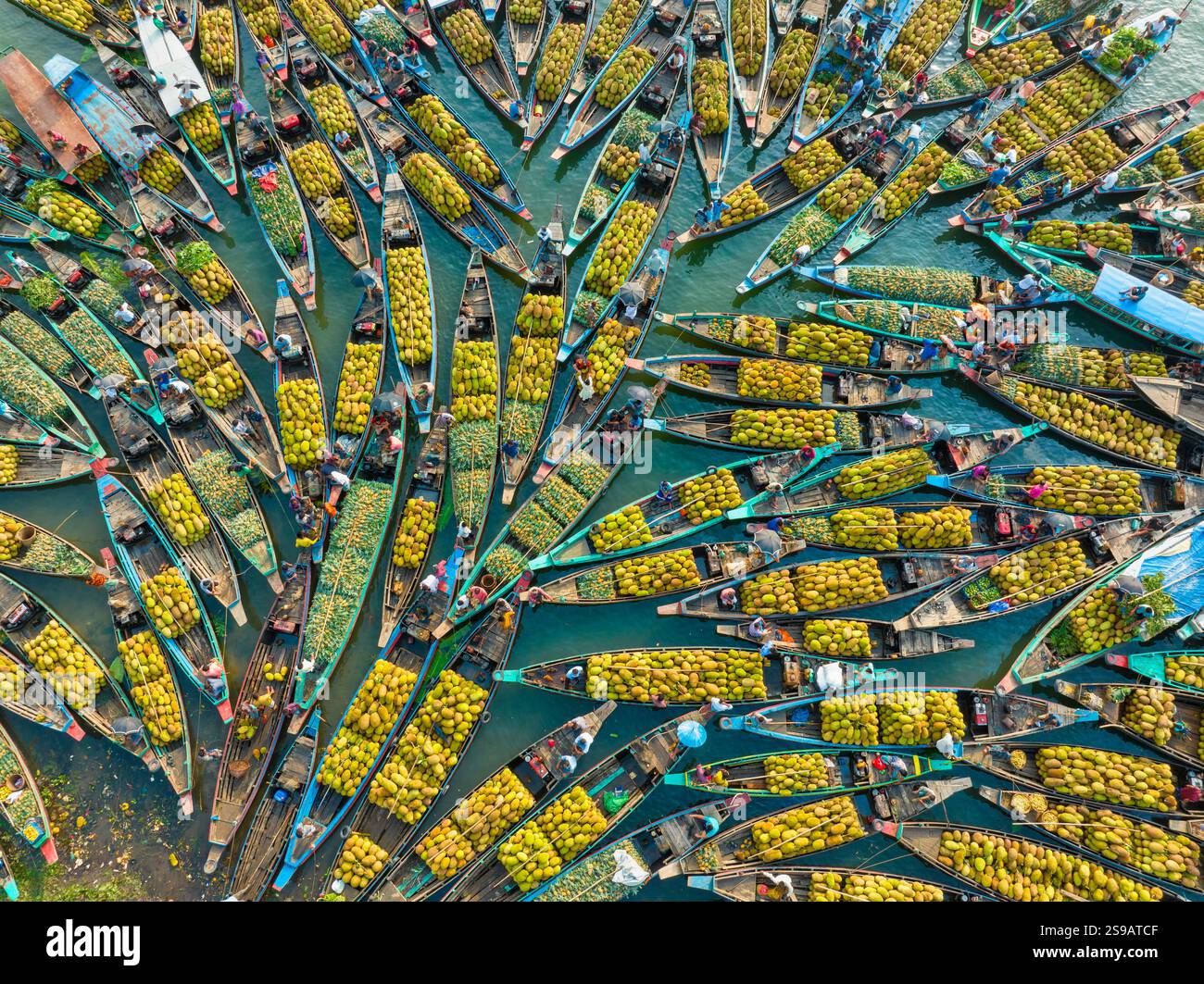 Aerial view of floating market of seasonal fruits on the boats in ...