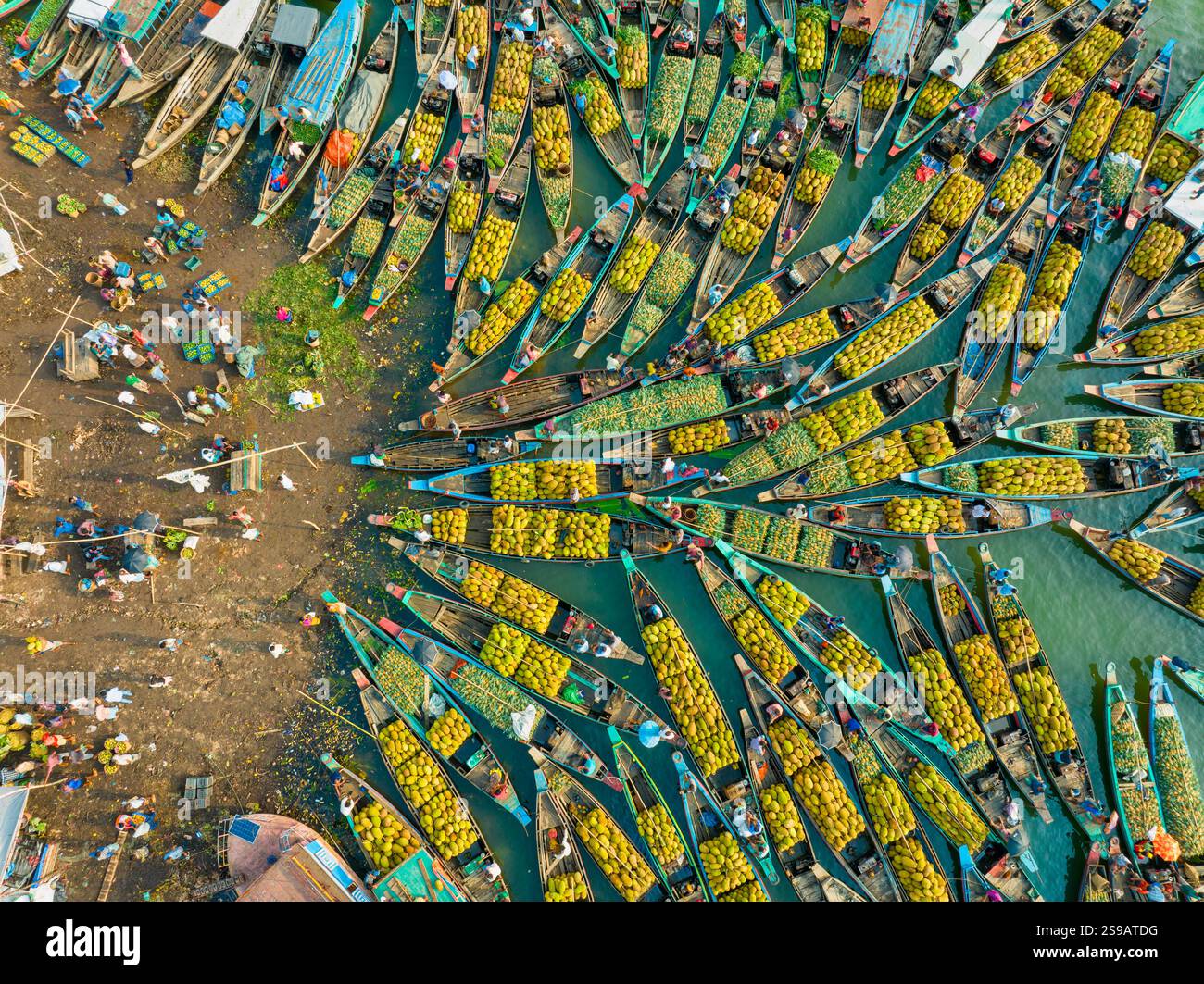 Aerial view of floating market of seasonal fruits on the boats in ...