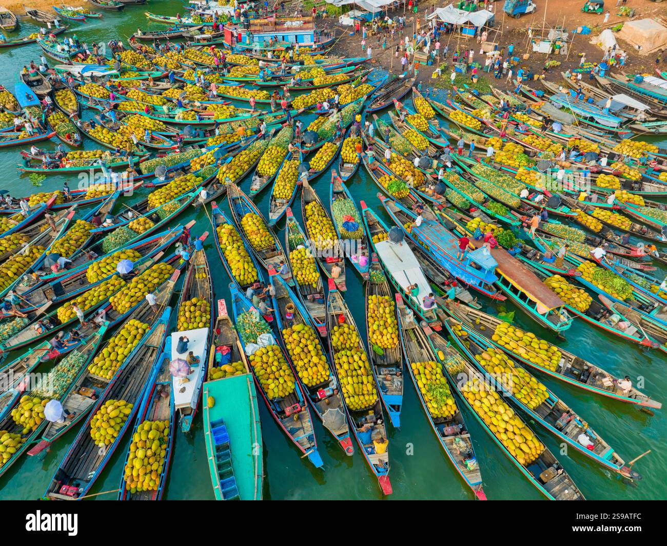 Aerial view of floating market of seasonal fruits on the boats in ...