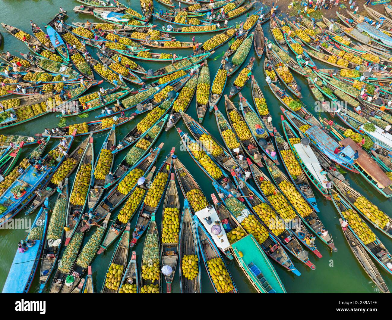 Aerial view of floating market of seasonal fruits on the boats in ...