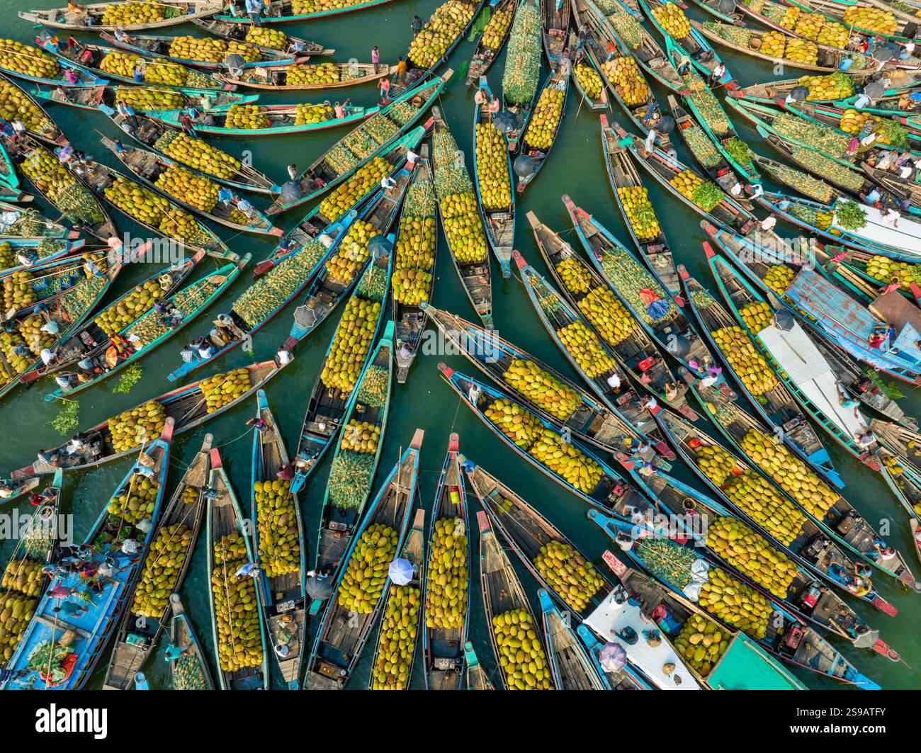 Aerial view of floating market of seasonal fruits on the boats in ...