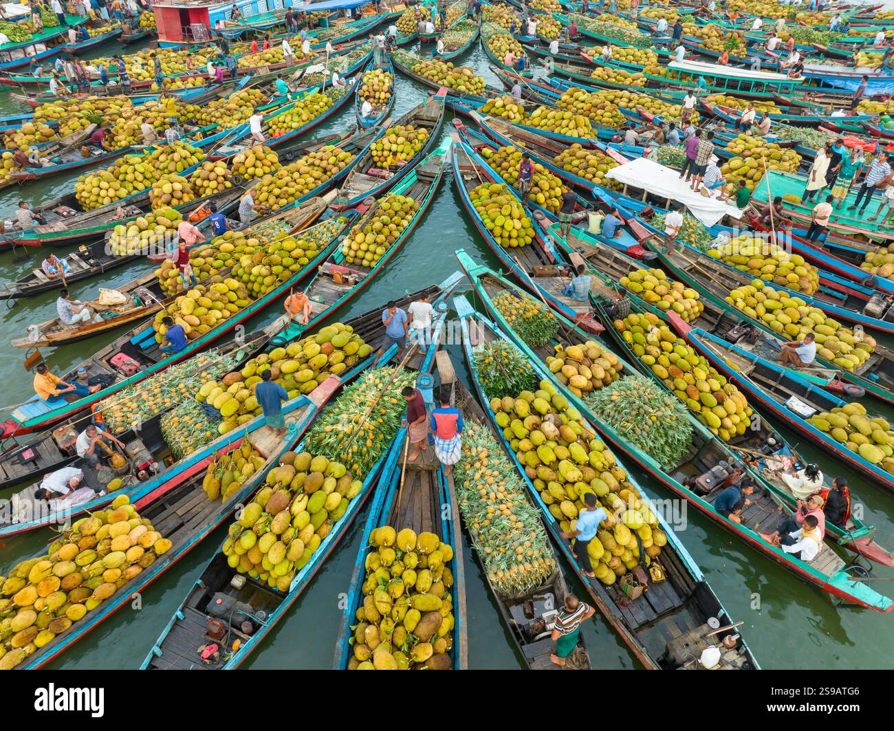 Aerial view of floating market of seasonal fruits on the boats in ...