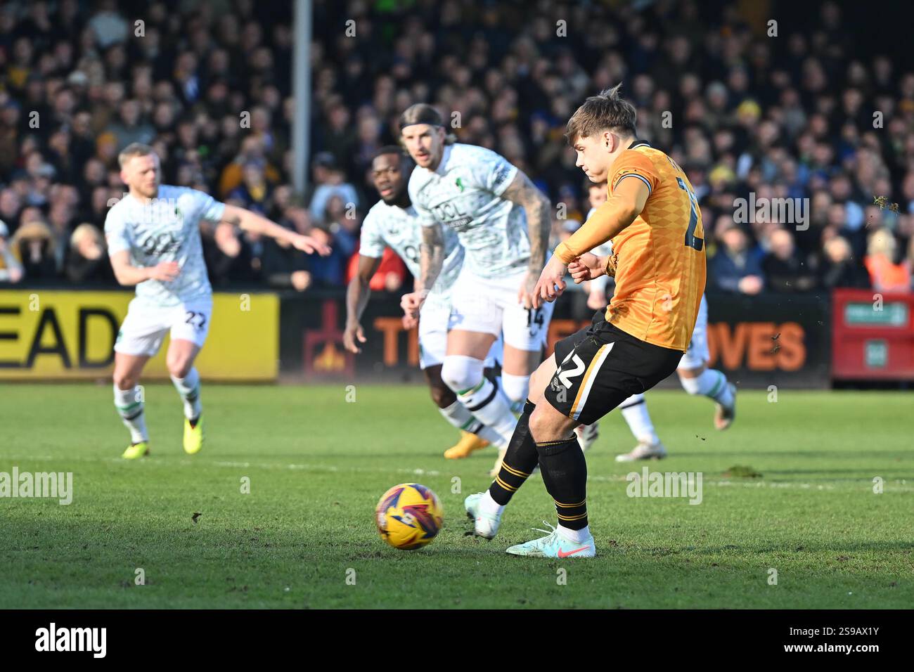 Josh Stokes (22 Cambridge United) scores from penalty spot during the ...
