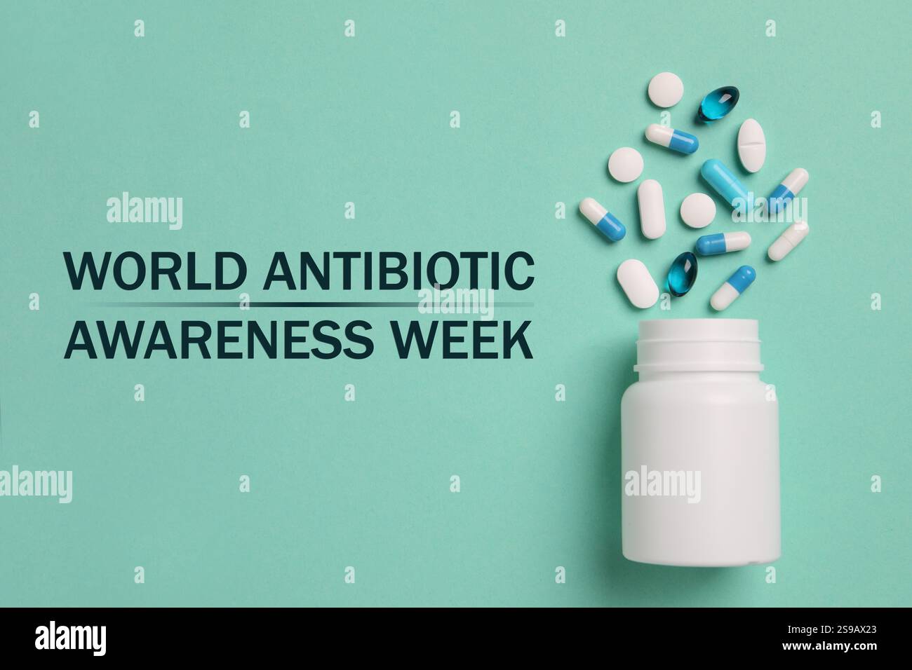World antibiotic awareness week. Bottle and scattered pills on ...