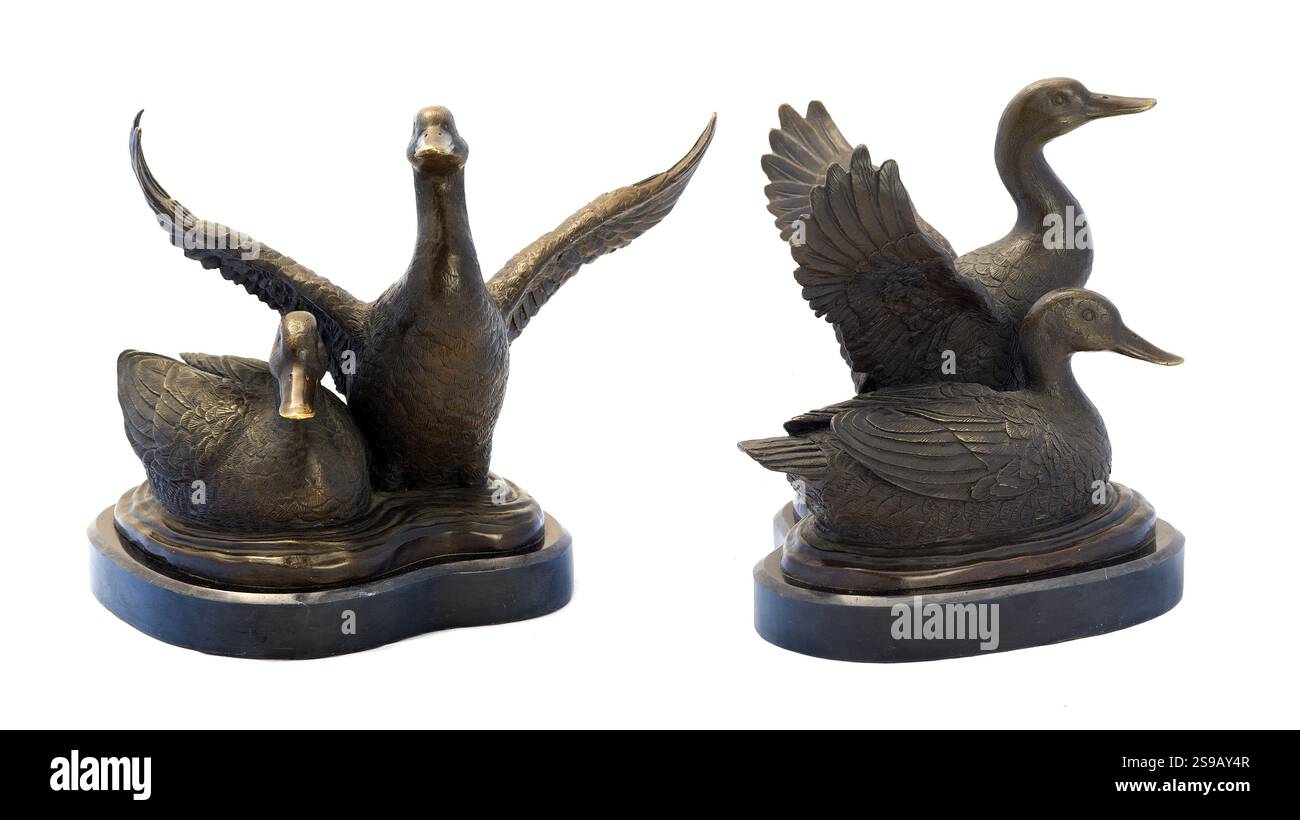 Antique bronze figure of two ducks playing Stock Photo - Alamy