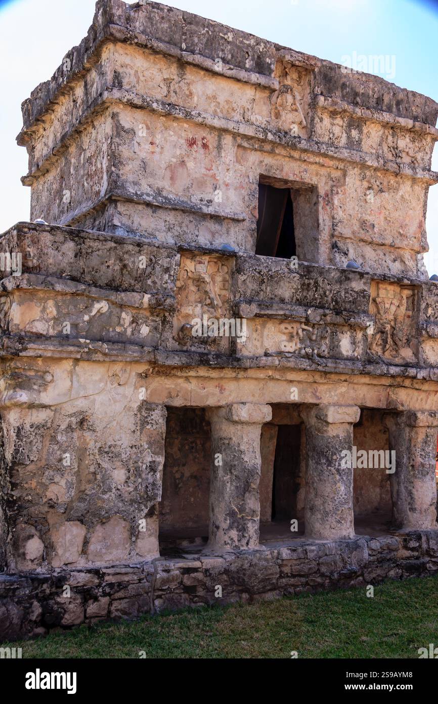 A large stone building with a window on the side. The building is old ...