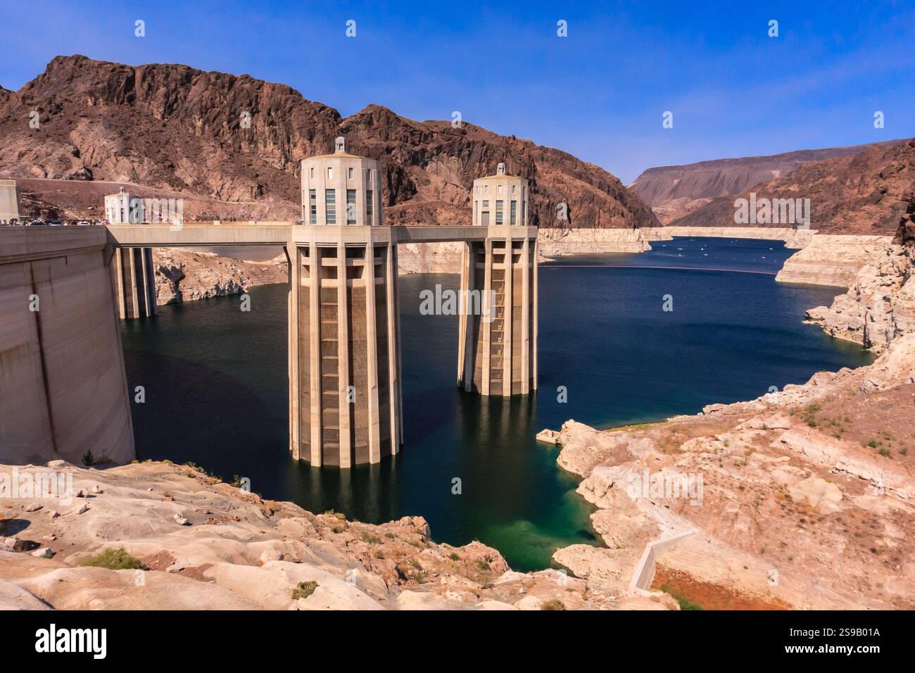 Hoover Dam, once known as Boulder Dam, is a concrete arch-gravity dam in the Black Canyon of the ...