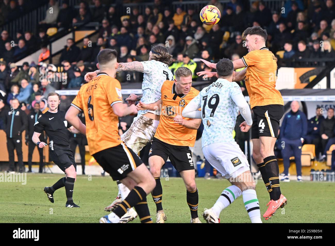 Paul Digby (4 Cambridge United) heads the ball during the Sky Bet ...