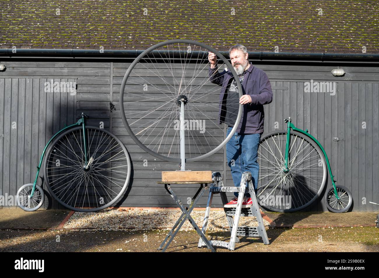 Matt Trott of Trott & Sons trues a Penny Farthing bicycle at his ...