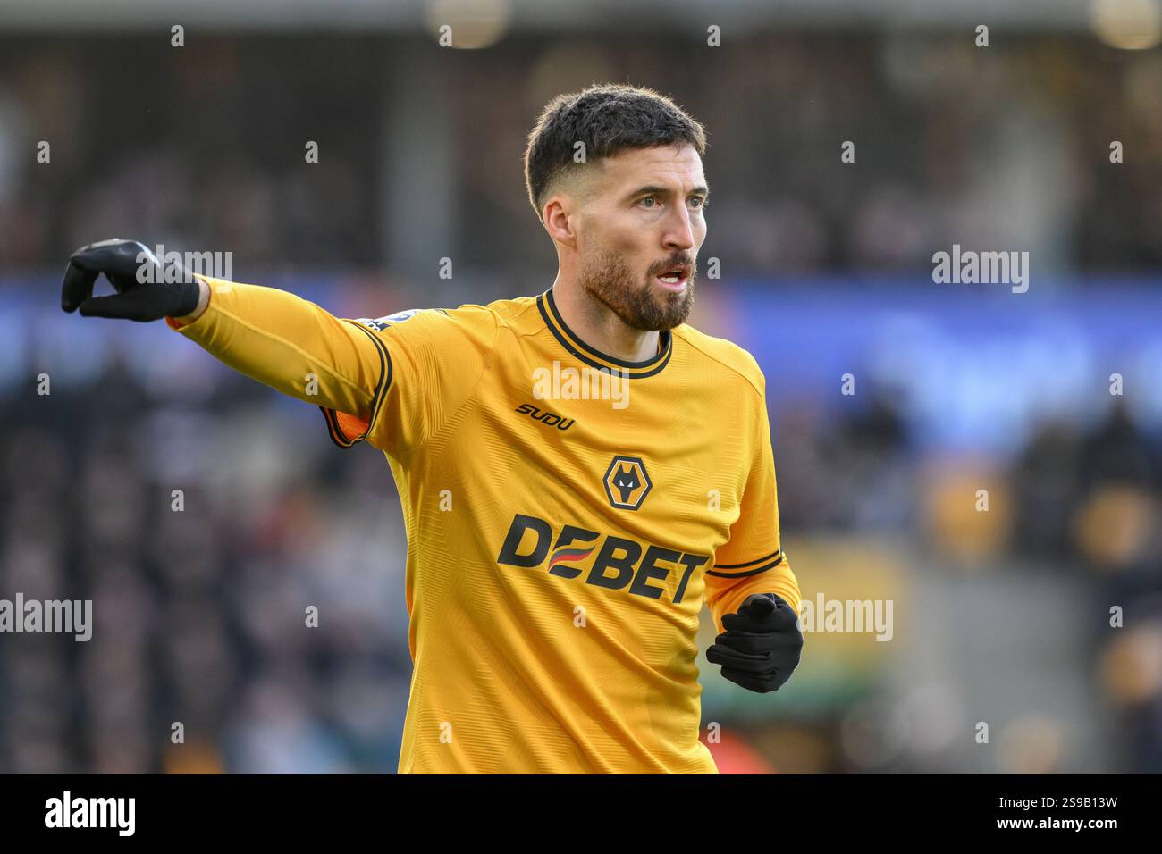 Matt Doherty of Wolverhampton Wanderers gives his team instructions ...