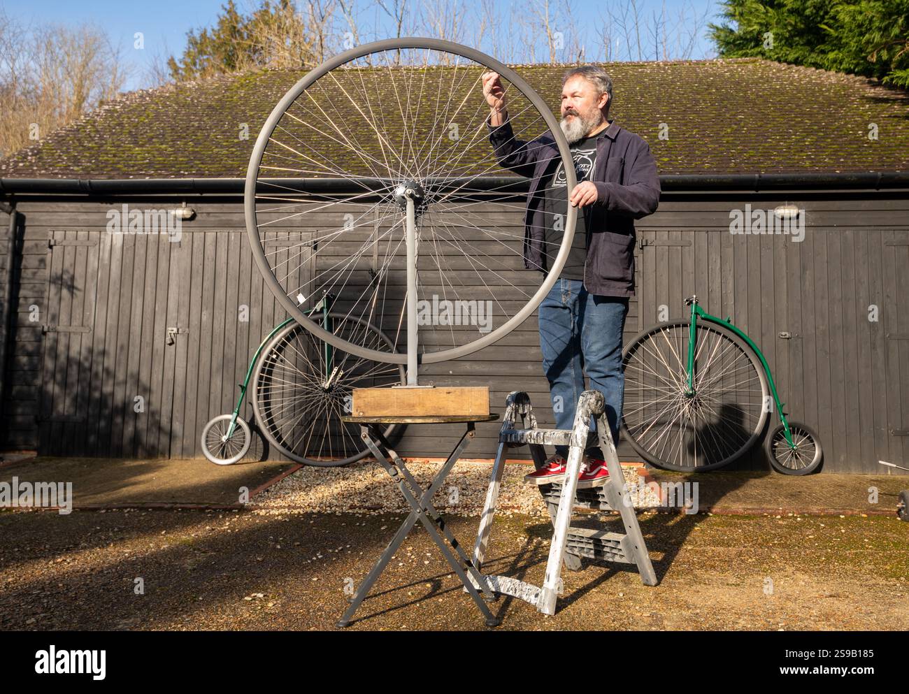 Matt Trott of Trott & Sons trues a Penny Farthing bicycle at his ...