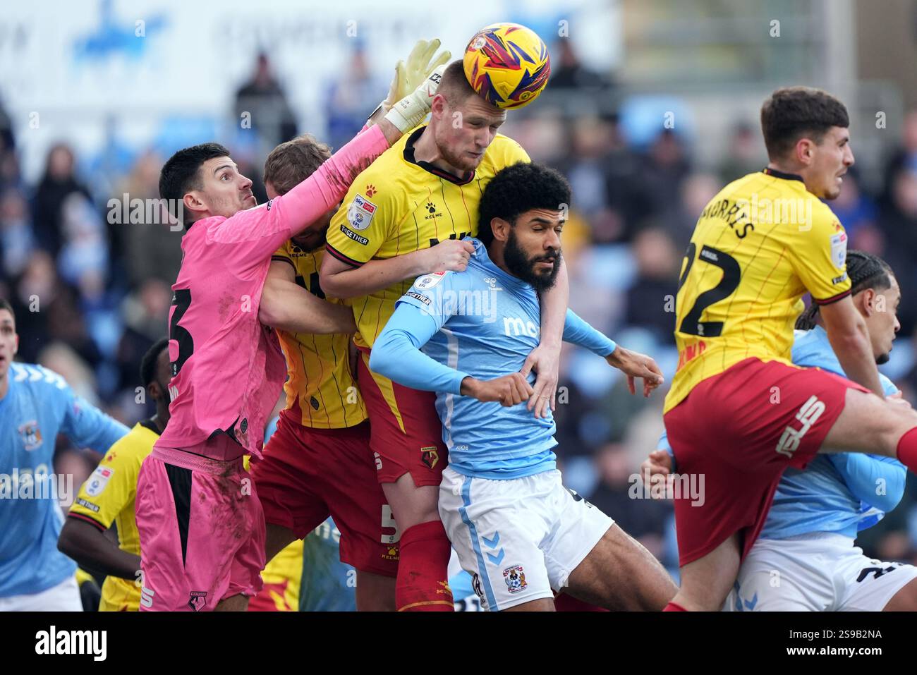 Watford's Mattie Pollock (centre) and Coventry City's Ellis Simms ...