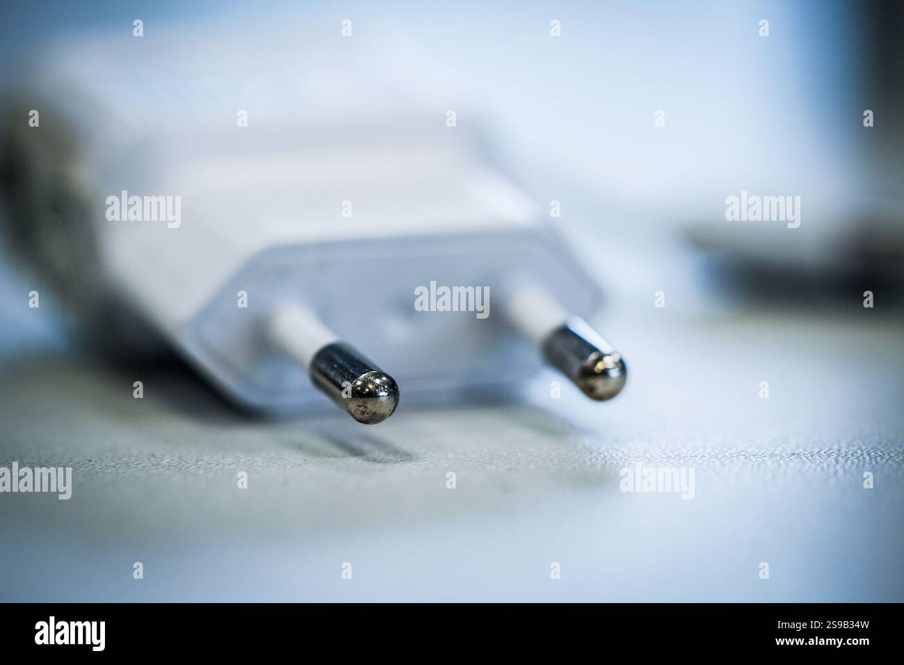 White electric saving plug in hi-res stock photography and images - Alamy