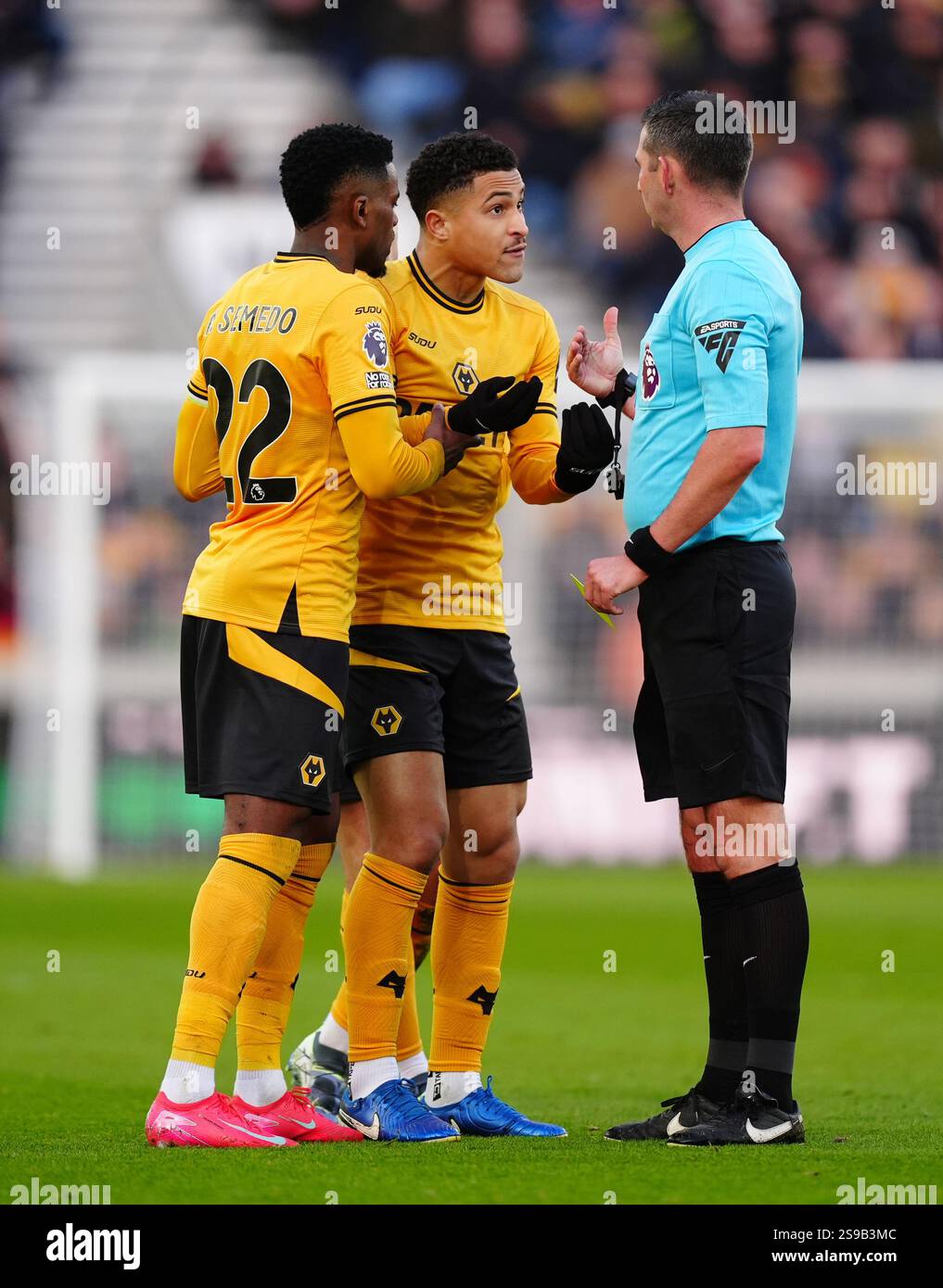 Wolverhampton Wanderers' players surround referee Michael Oliver during ...