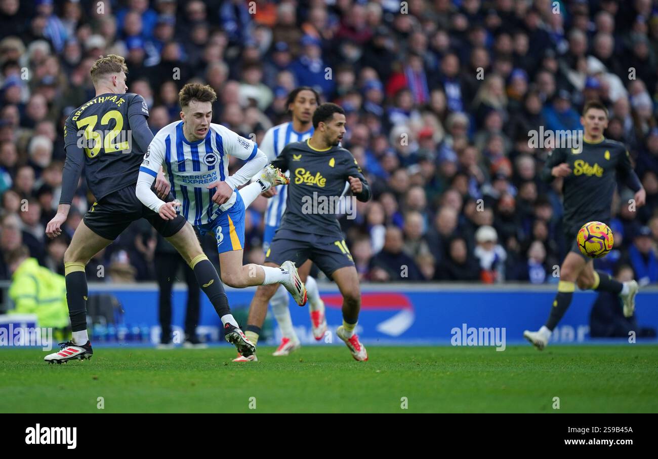 Everton's Jarrad Branthwaite (left) challenges Brighton and Hove Albion ...