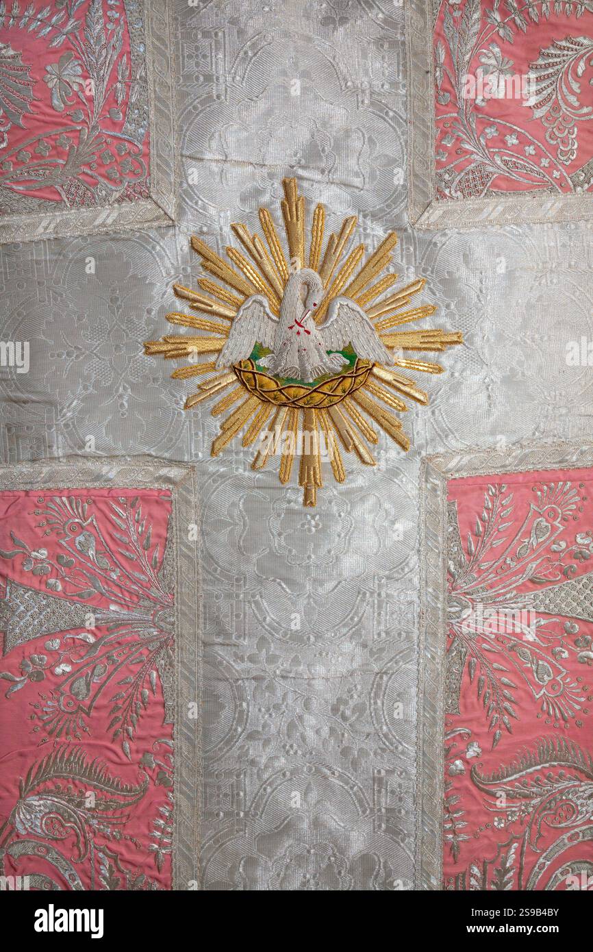 The pelican bird from catholic vestment from 19. cent. as the symbol of ...