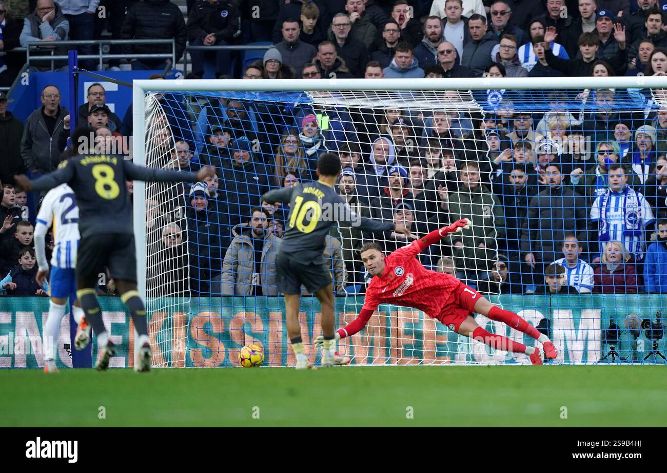 Brighton and Hove Albion goalkeeper Bart Verbruggen dives in vain as ...