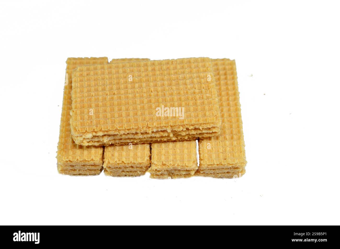 layers of wafer biscuits filled with creamy vanilla, a wafer is a crisp ...