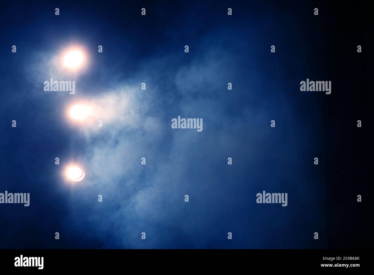 Professional spotlights and smoke on stage in theatre Stock Photo - Alamy