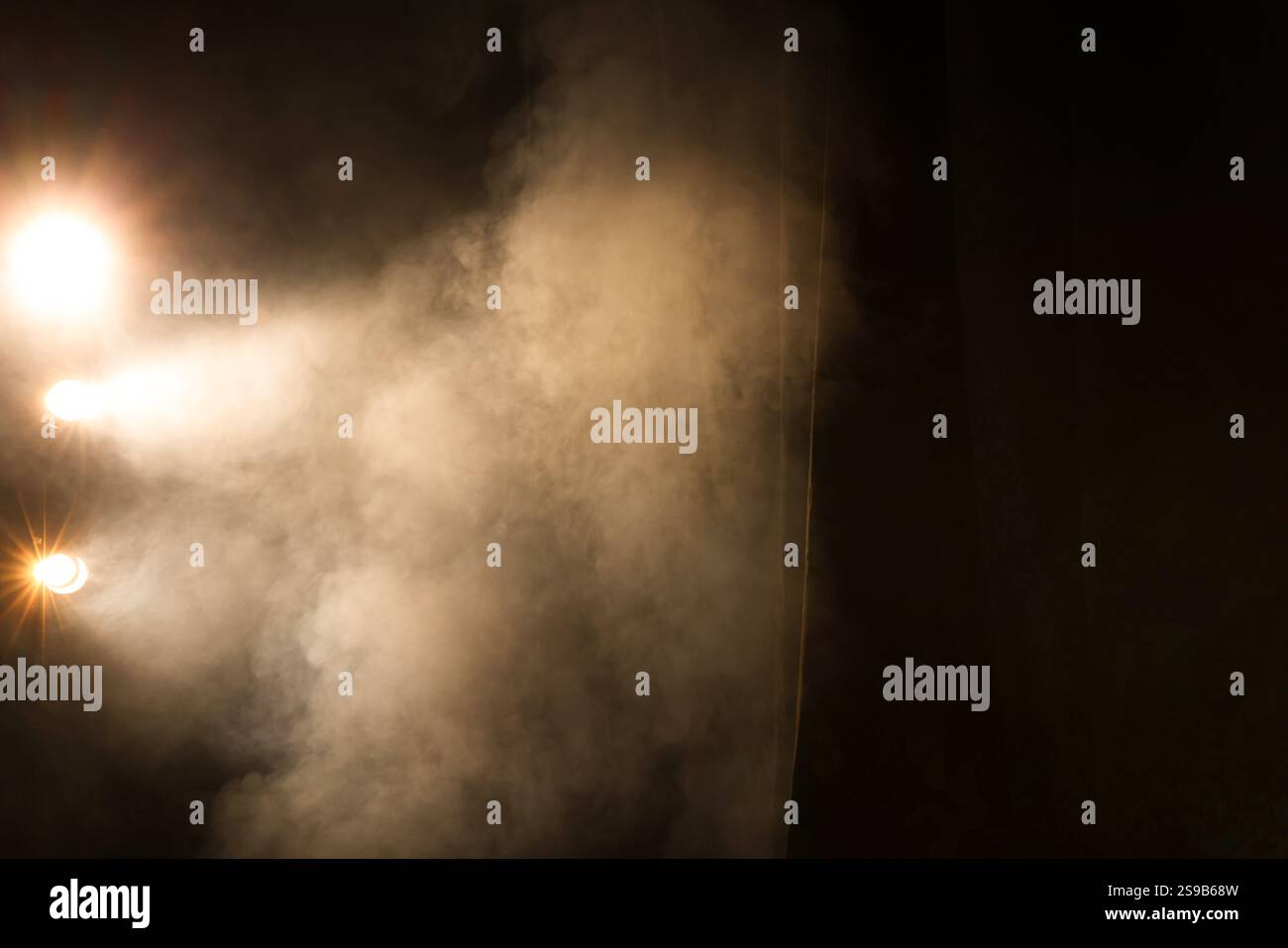 Professional spotlights and smoke on stage in theatre Stock Photo - Alamy