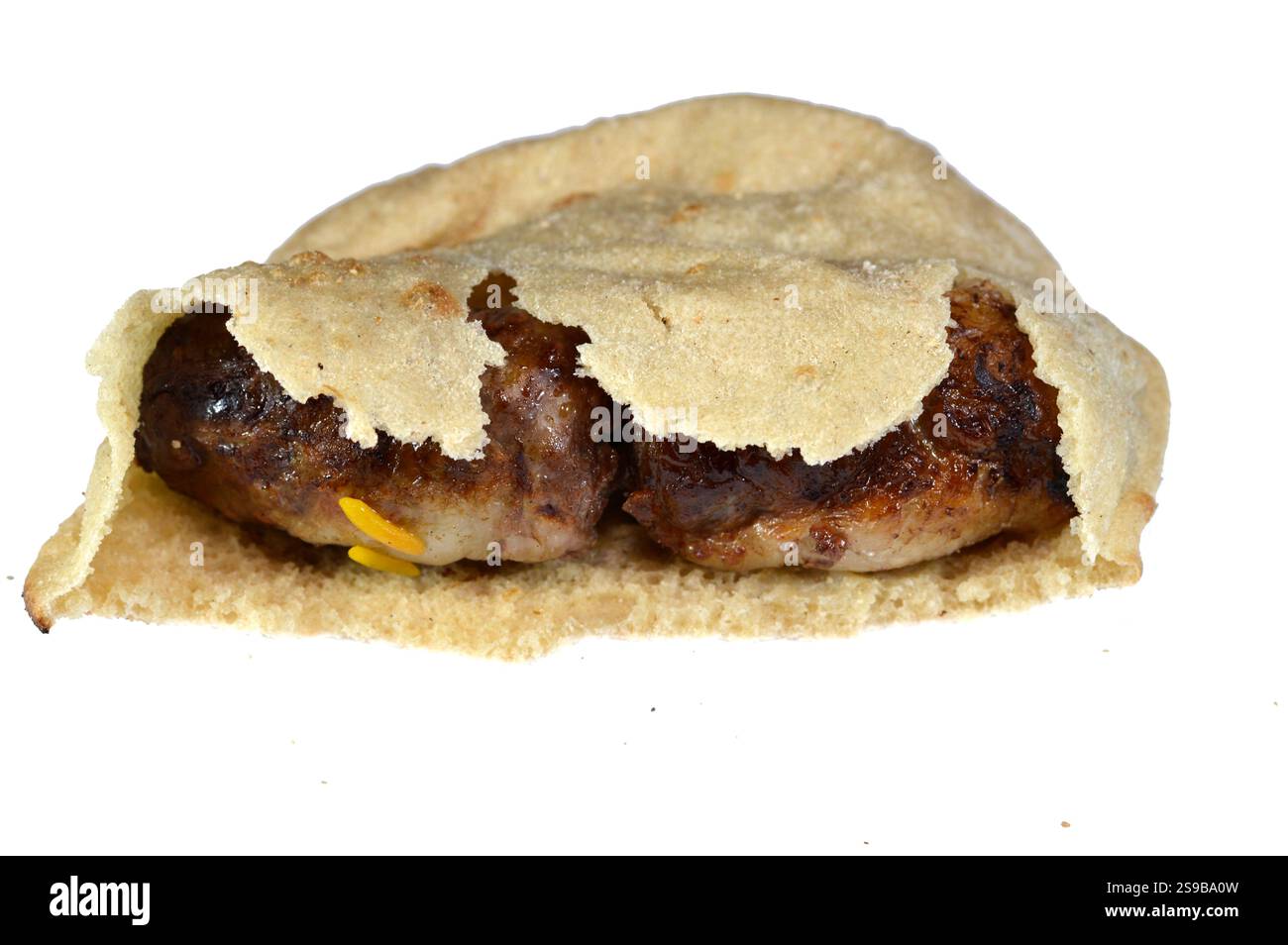 A sandwich of beef Kofta and tarb kofta shish, minced meat wrapped in ...