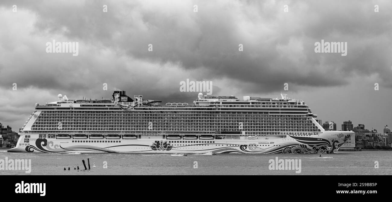 New York, USA - July11, 2023: Cruise ship Norwegian Joy Sailing next to ...