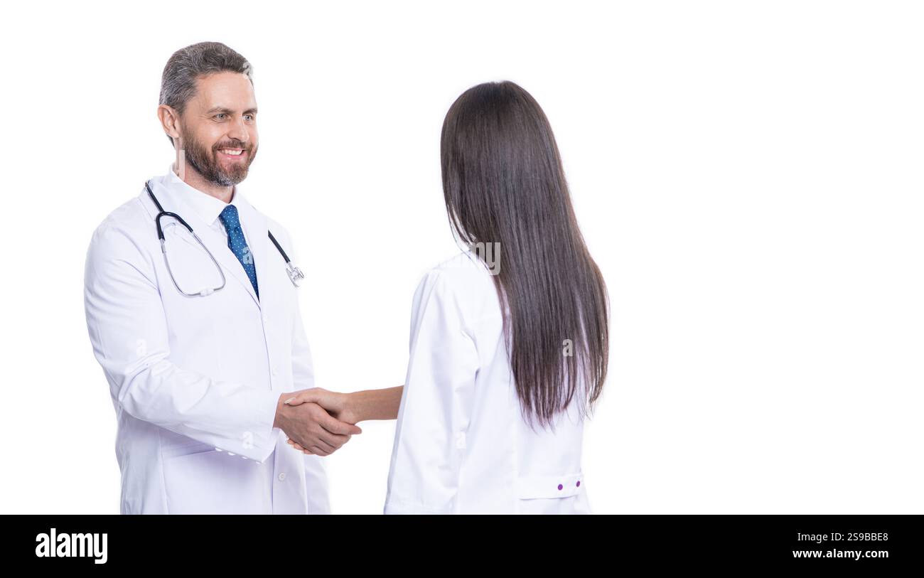 doctor handshake with nurse. two doctor shaking hands isolated on white ...