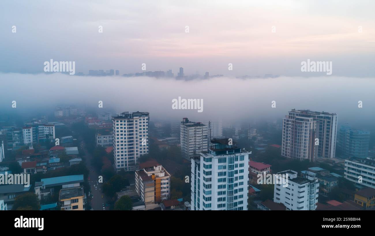 Aerial drone view of a densely packed urban city skyline with a visible ...